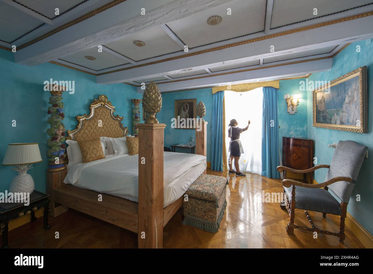 Malta, Valletta, bedroom with sky blue walls decorated with a bed with ...