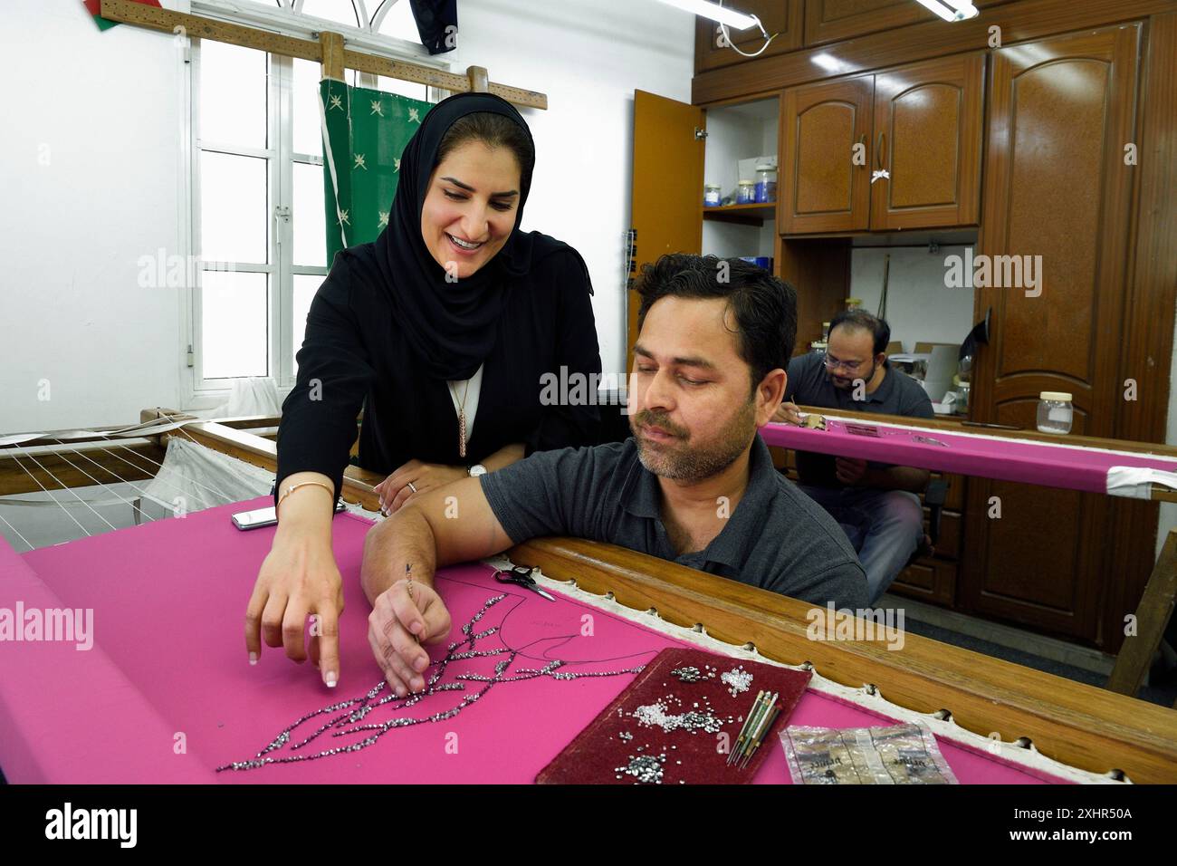 Sultanate of Oman, Muscat, Al-Athaiba district, haute couture workshop ...