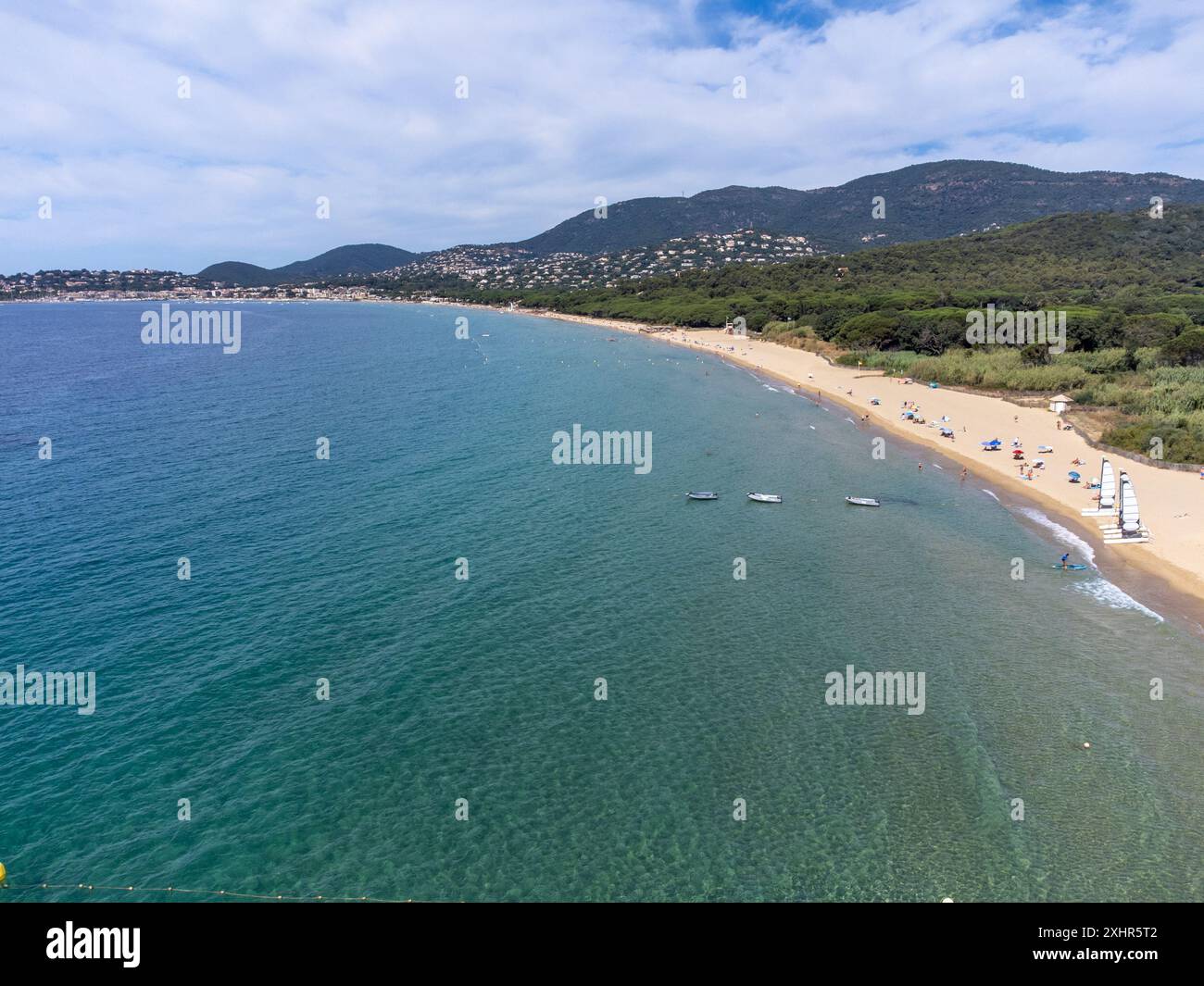 Aerial view on boats, crystal clear blue water of Plage du Debarquement ...