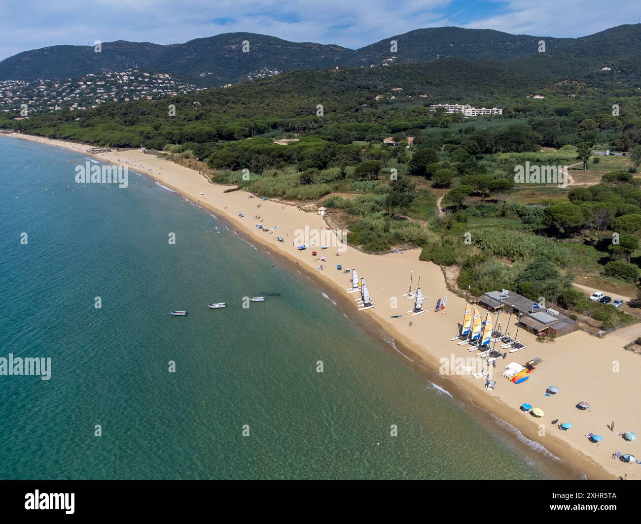 Aerial view on boats, crystal clear blue water of Plage du Debarquement ...