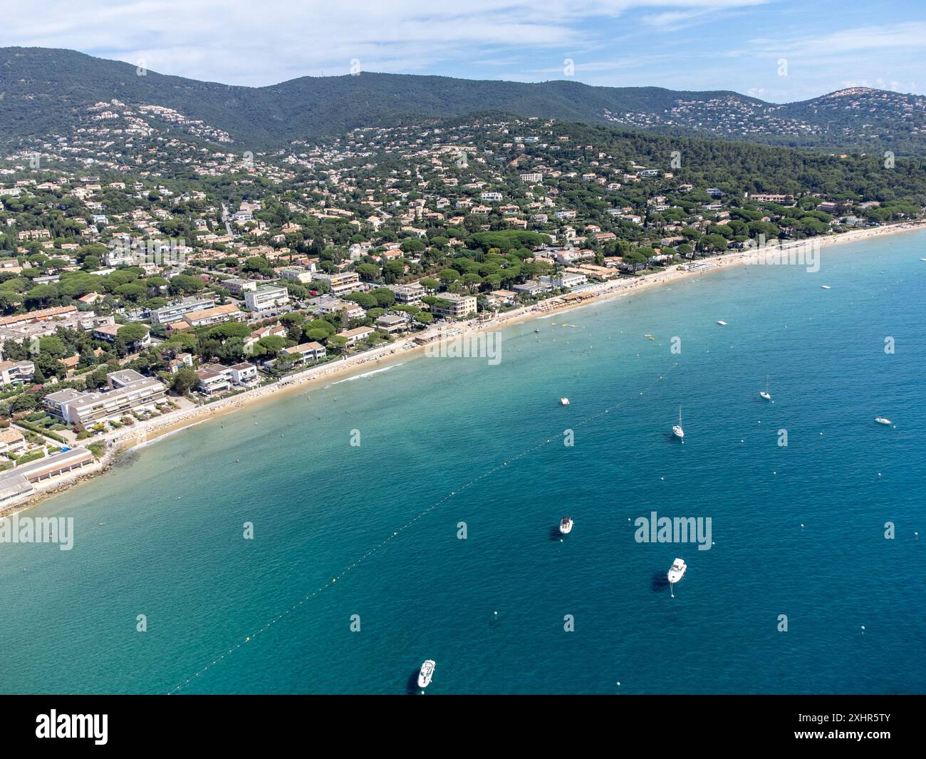 Aerial view on boats, crystal clear blue water of Plage du Debarquement ...