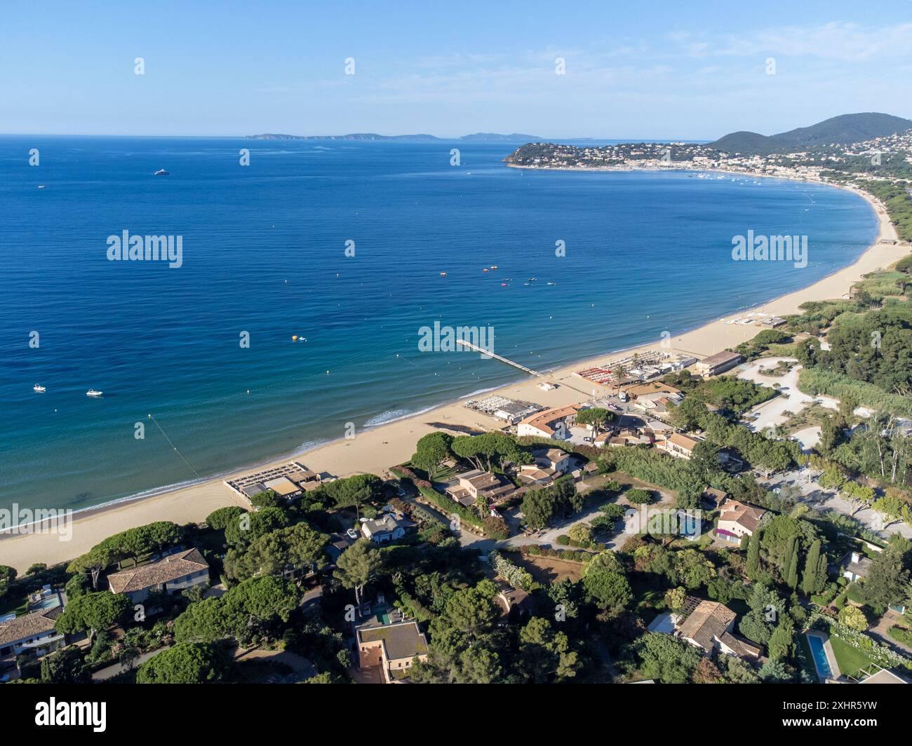 Aerial view on boats, crystal clear blue water of Plage du Debarquement ...