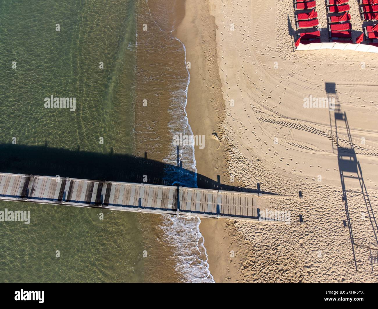 Aerial view on boats, crystal clear blue water of Plage du Debarquement ...