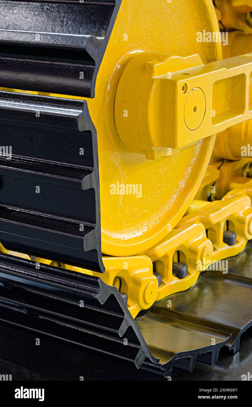 Chassis of a generic crawler tractor or excavator, close up shot ...