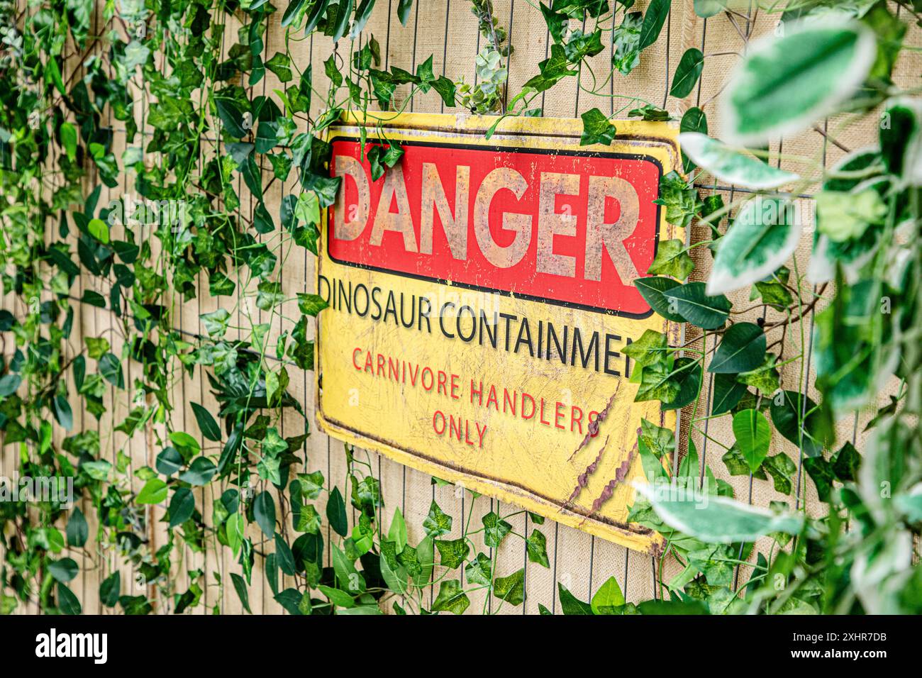 Danger, dinosaur containment, carnivore handlers only sign with a ...