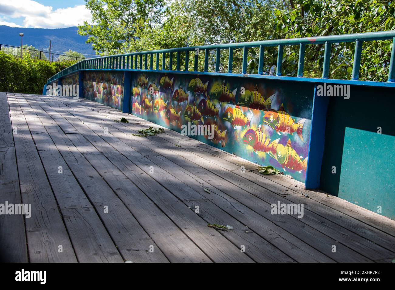 Mural of fish on the railing of pedestrian bridge at Lions Memorial ...