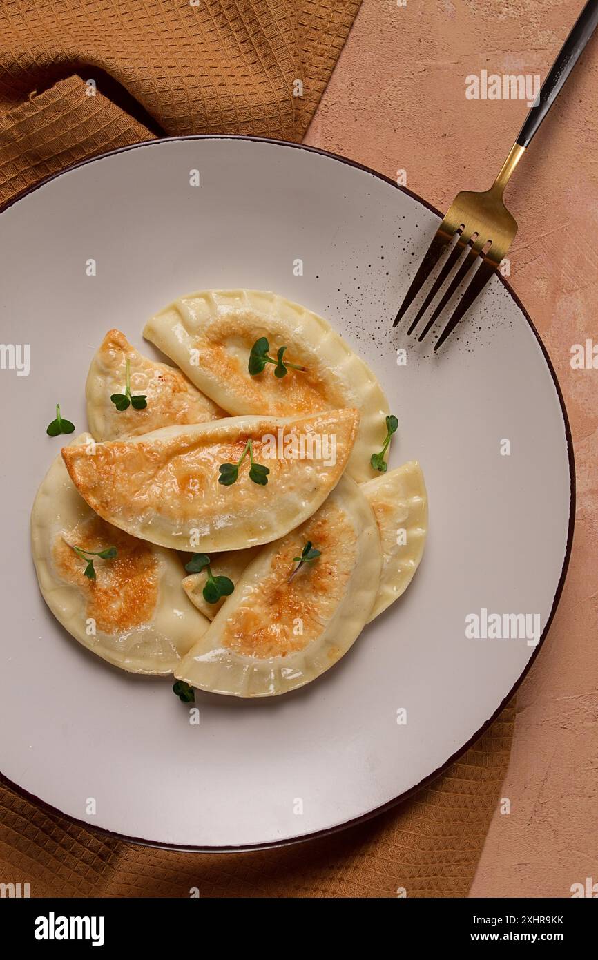Pierogi, a traditional dish of Polish cuisine, dumplings, top view ...