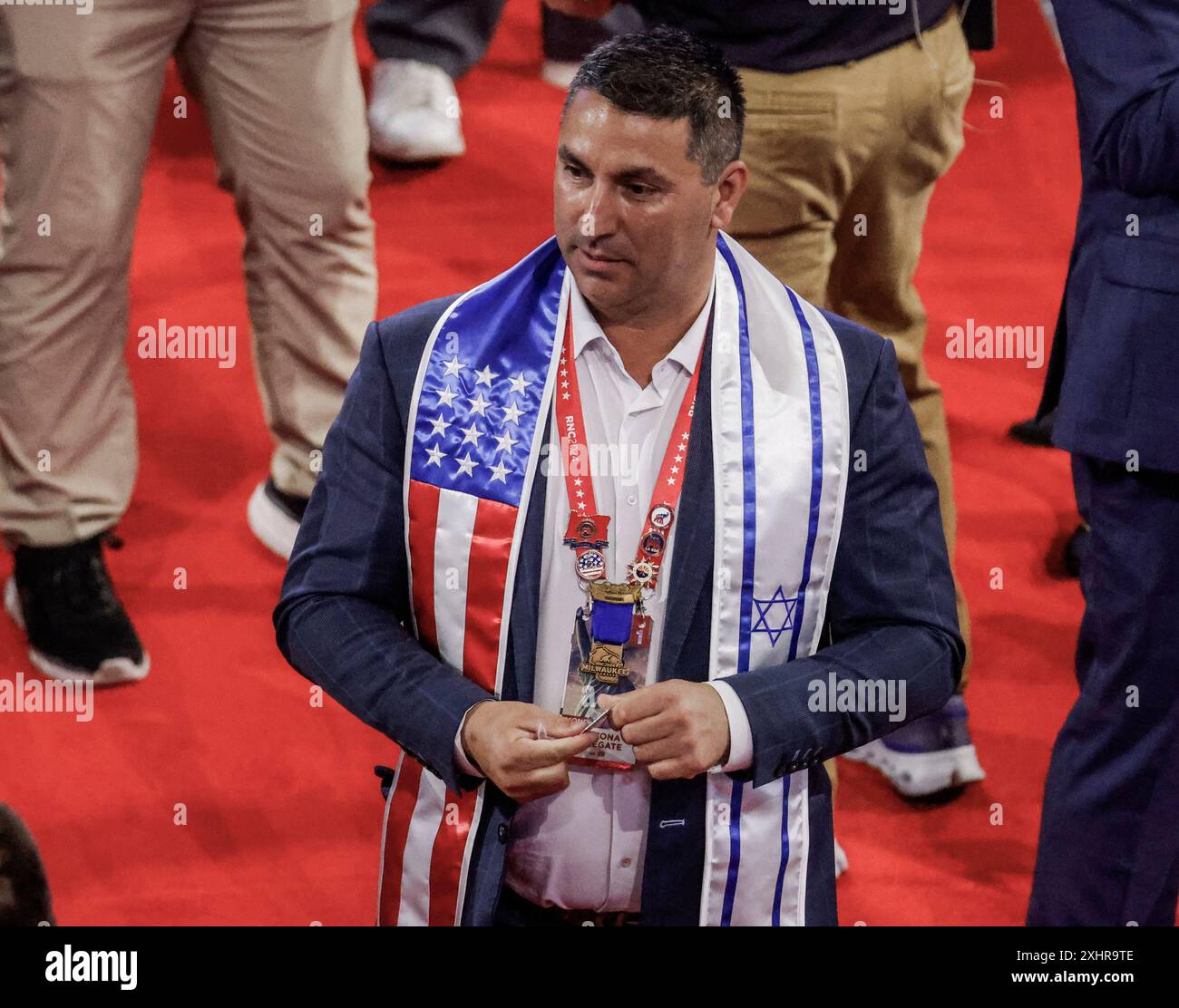 Milwaukee, United States. 15th July, 2024. A man walks on the floor of ...