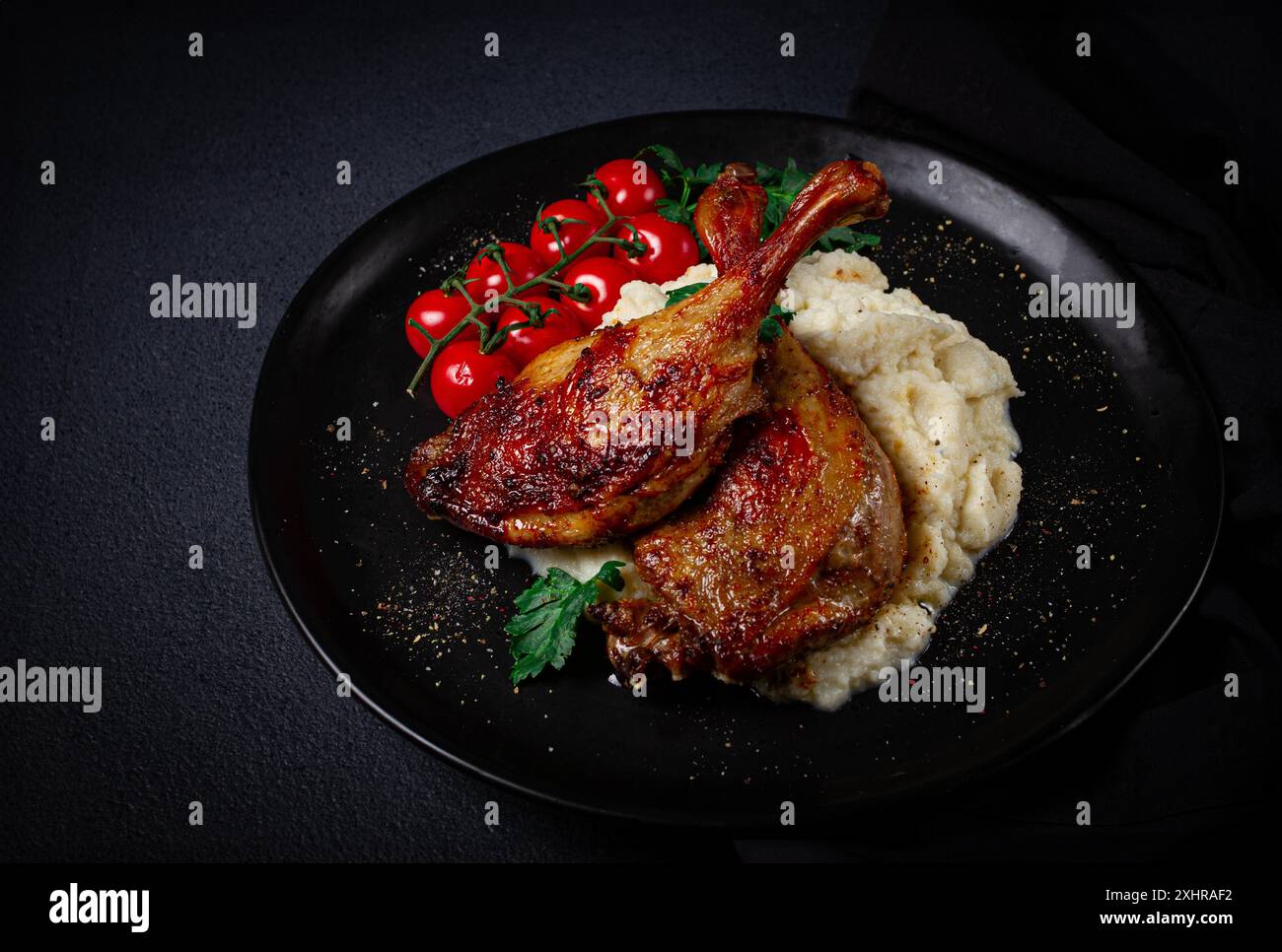 Fried duck shank, cauliflower puree, cherry tomatoes, homemade, no ...