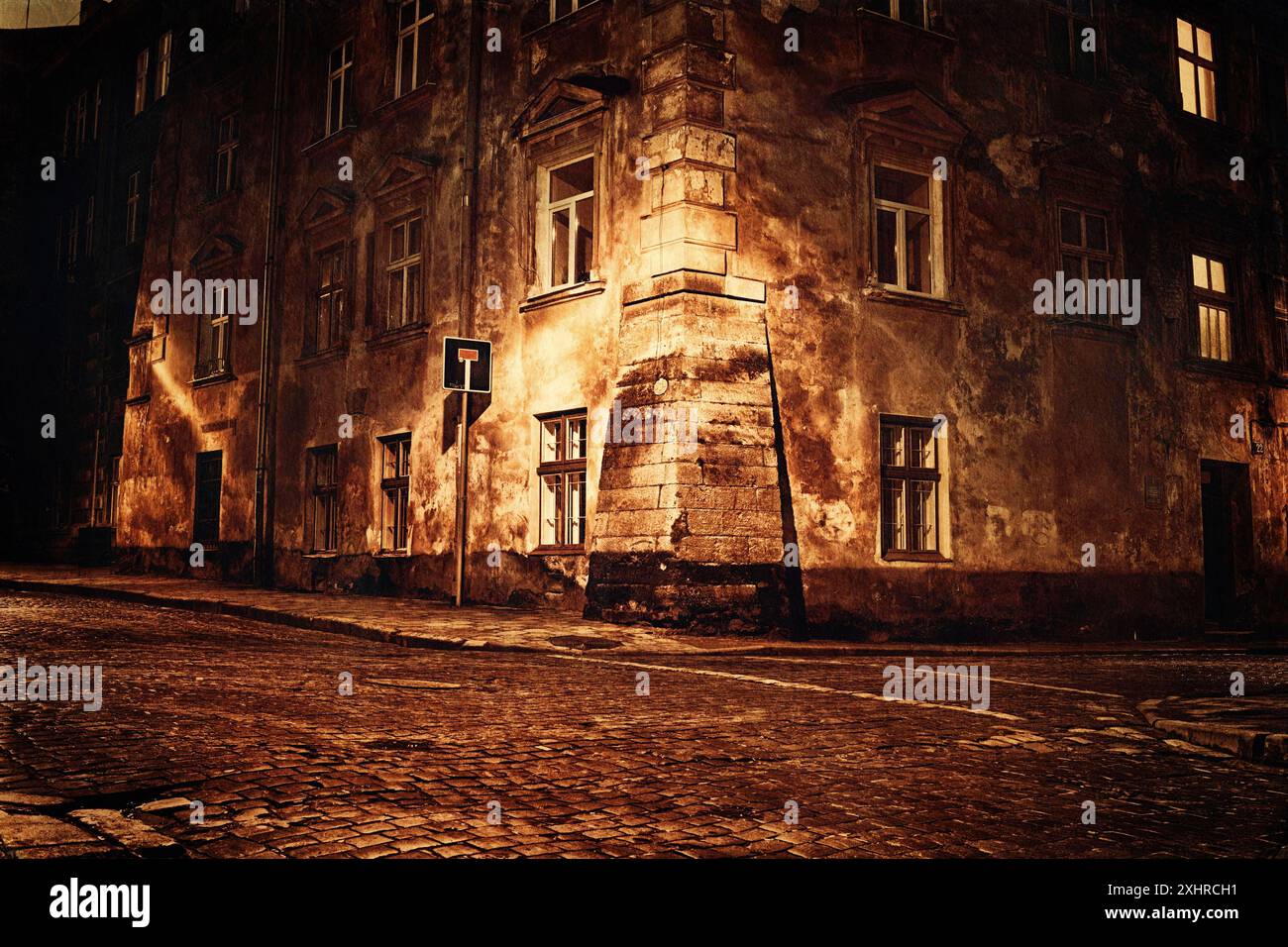 Vintage photo of old European town at night Stock Photo - Alamy
