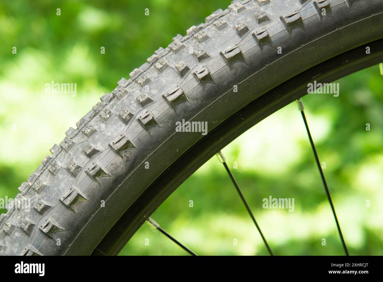 segment of mountain bike tire on a wheel Stock Photo - Alamy
