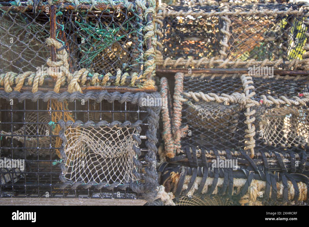 Frontal view of a pile of fishing utensils: crab traps, lobster traps ...