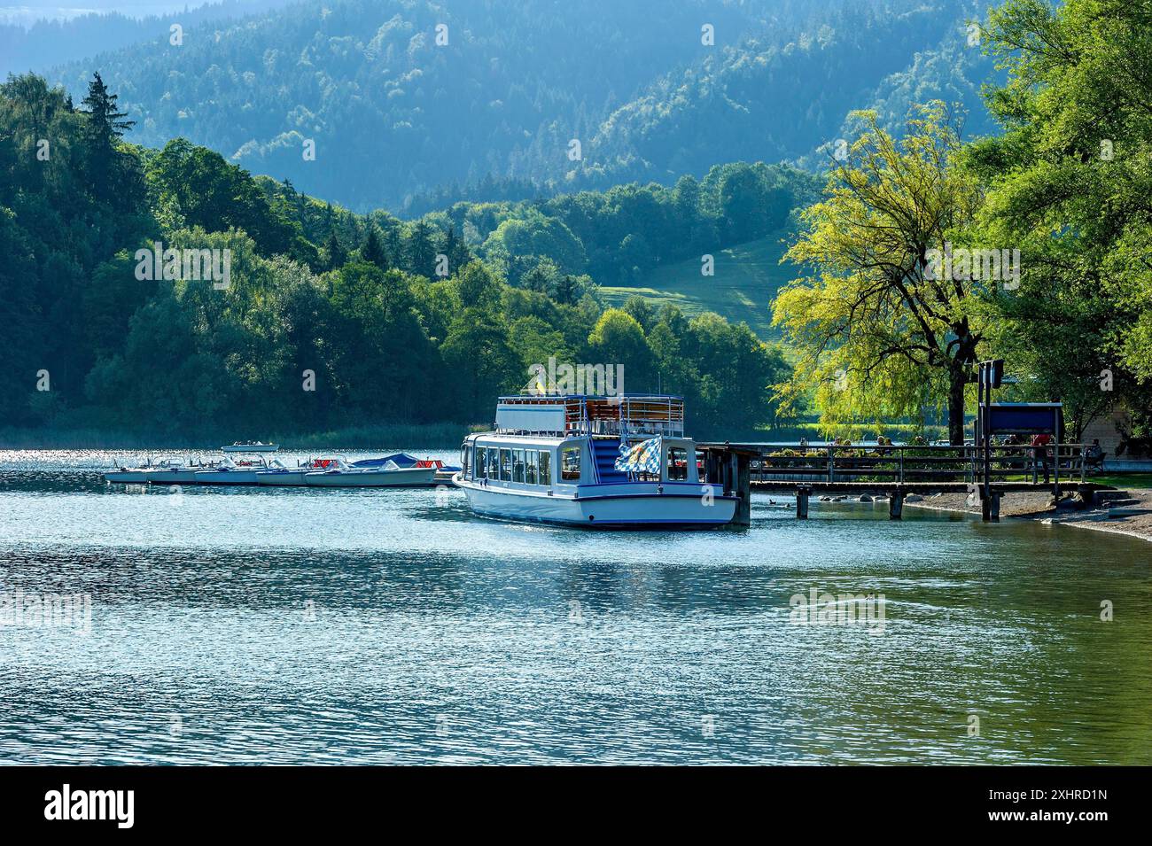 Mooring for motorised boat, jetty with passenger boat, shore, boat trip ...