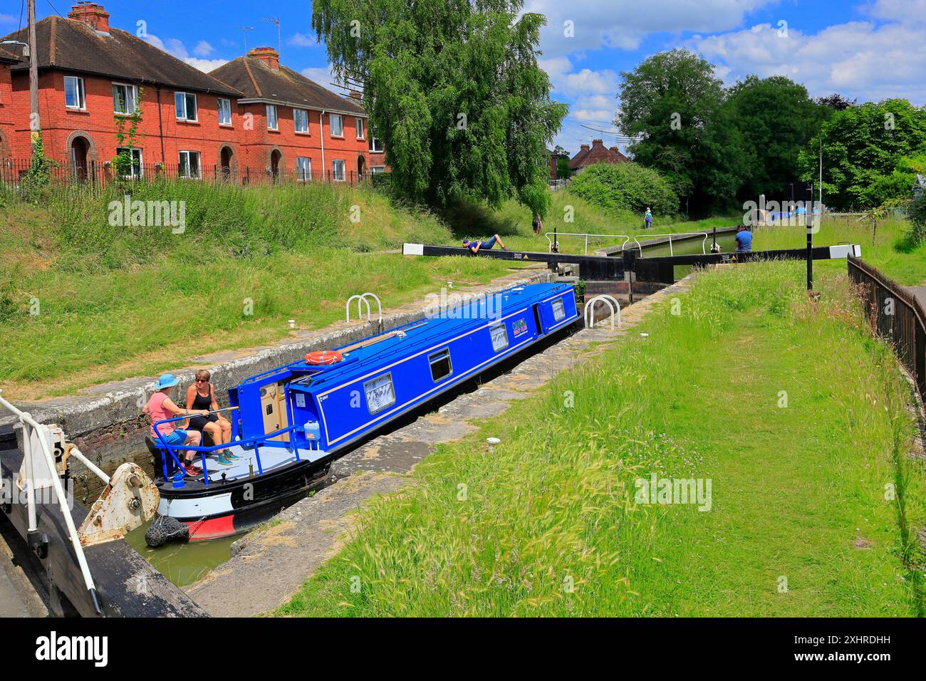 Narrow boat going through lock on The Kennett & Avon Canal at Devizes-a ...
