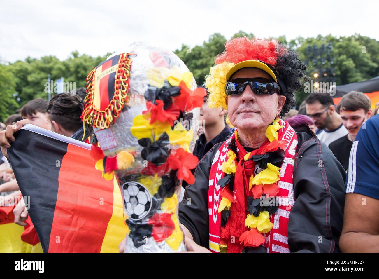 Football fan with self-made trophy at the fan zone at the Brandenburg ...