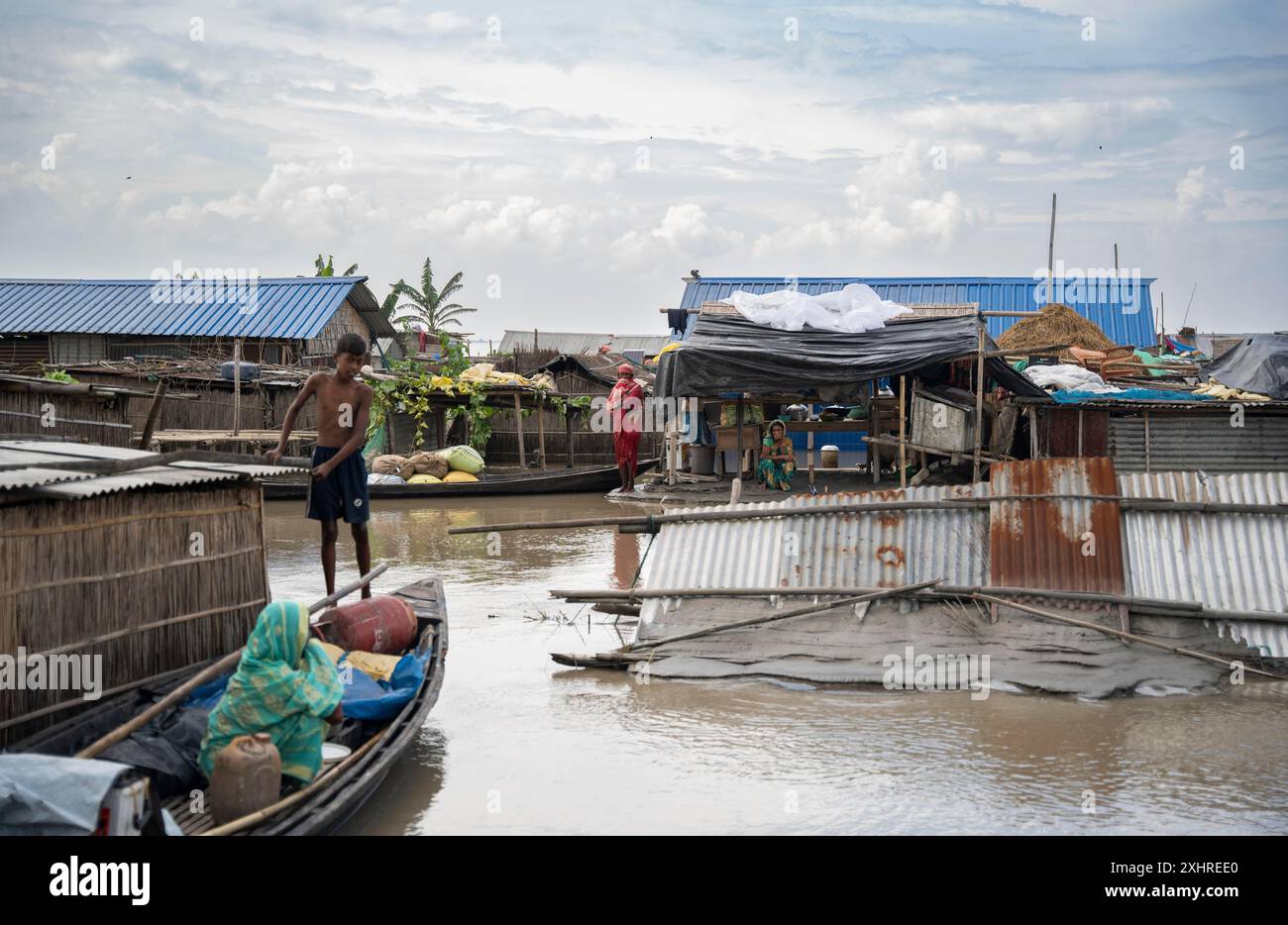 Morigaon, India. 4 July 2024. A settlement is partially submerged in ...