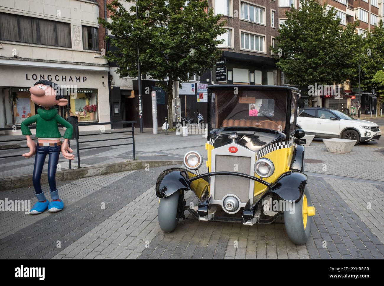 SCULPTURE OF THE FAMOUS COMIC BOOK CHARACTER GASTON LAGAFFE AND HIS CAR ...