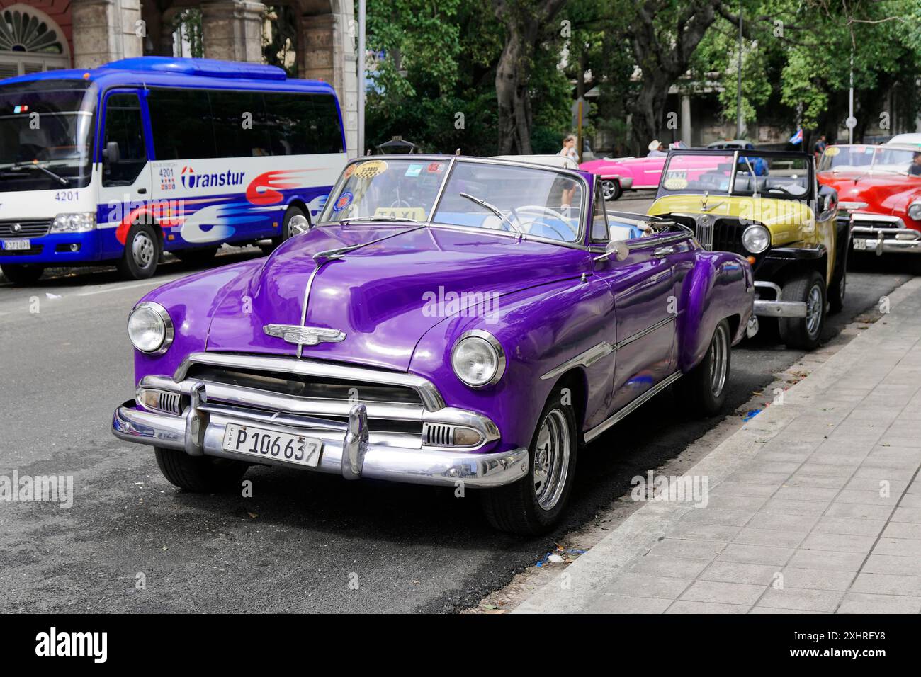 Havana, Cuba, Central America, retro car in purple on a roadside car ...