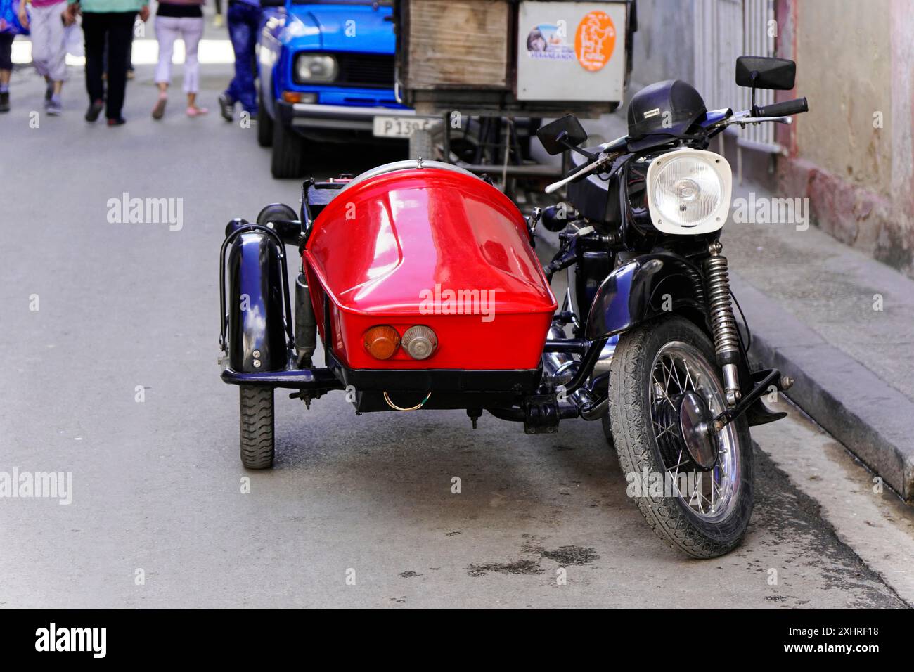 Black and red motorbike with sidecar on a road, Cuba, Greater Antilles ...