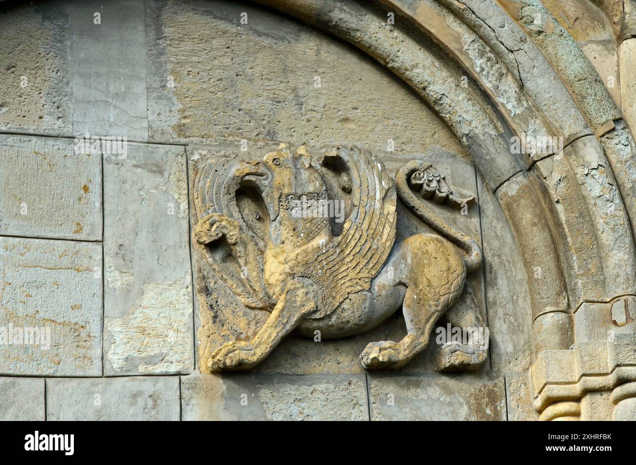 Relief sculpture of a mythical bird of prey on the east facade of the ...