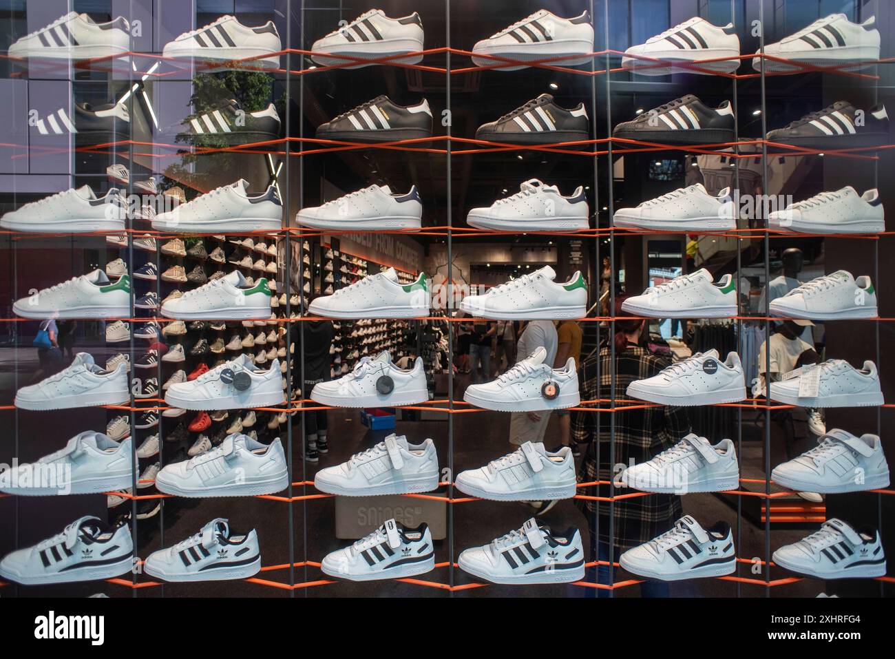 Presentation in a shop window of sports shoes in a sports shop, Bavaria ...