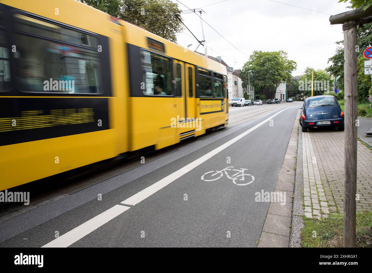 Cycle lane in Essen, cyclists have their own lane on a city centre ...