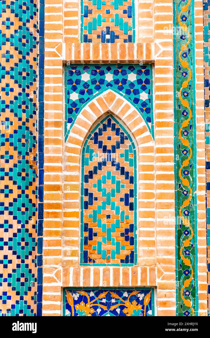 Detail from islamic style ceramic tile covered wall, geometric and ...