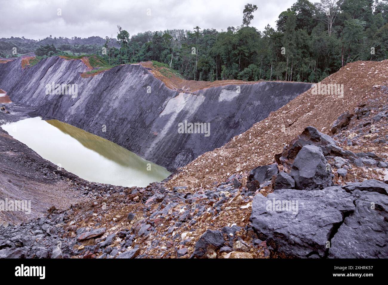 Borneo, Indonesia: An open land of a coal mine Stock Photo - Alamy