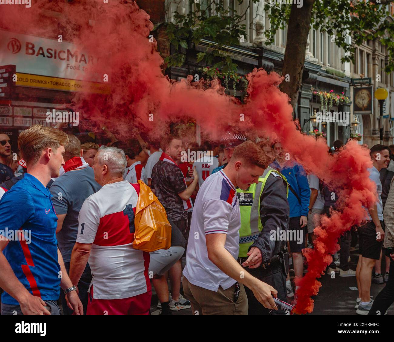 England football supporters let off smoke flares as they gather in ...