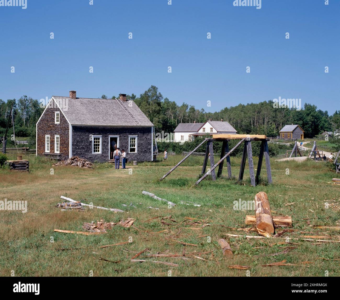 Traditional costumed figures at Leger House, Acadian Historical Village ...