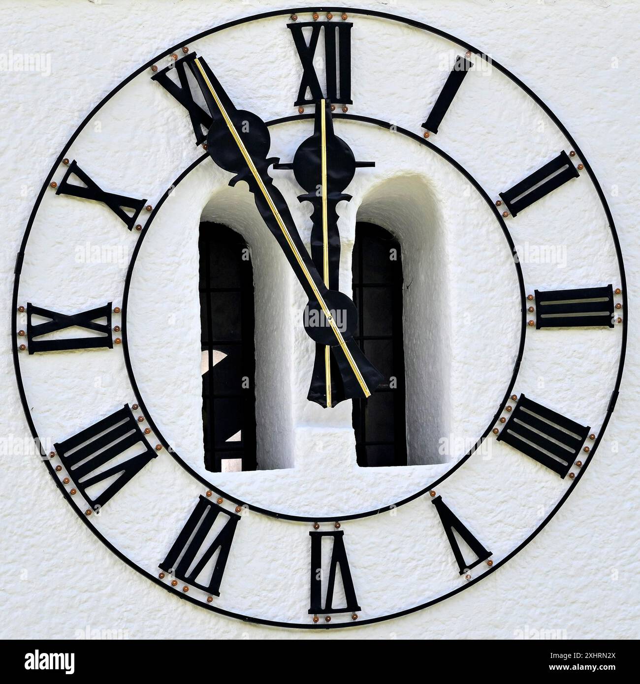 Church clock five to twelve Stock Photo - Alamy