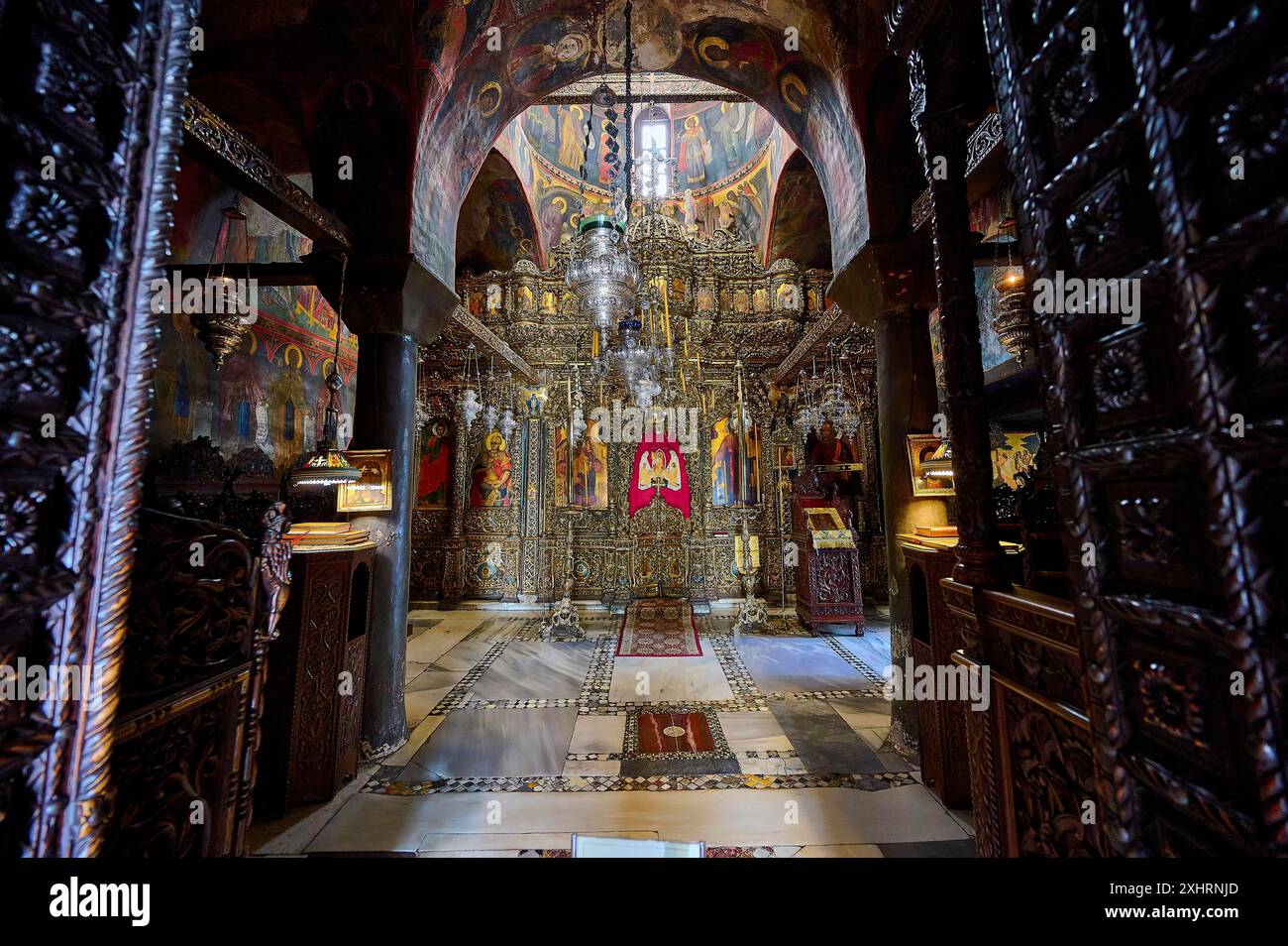 Interior view of a magnificent Orthodox church with icons, altarpieces and elaborate decoration ...