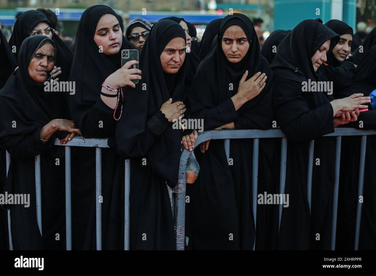 Karbalaa, Iraq. 15th July, 2024. Iraqi Shiite Muslim women observe the ...