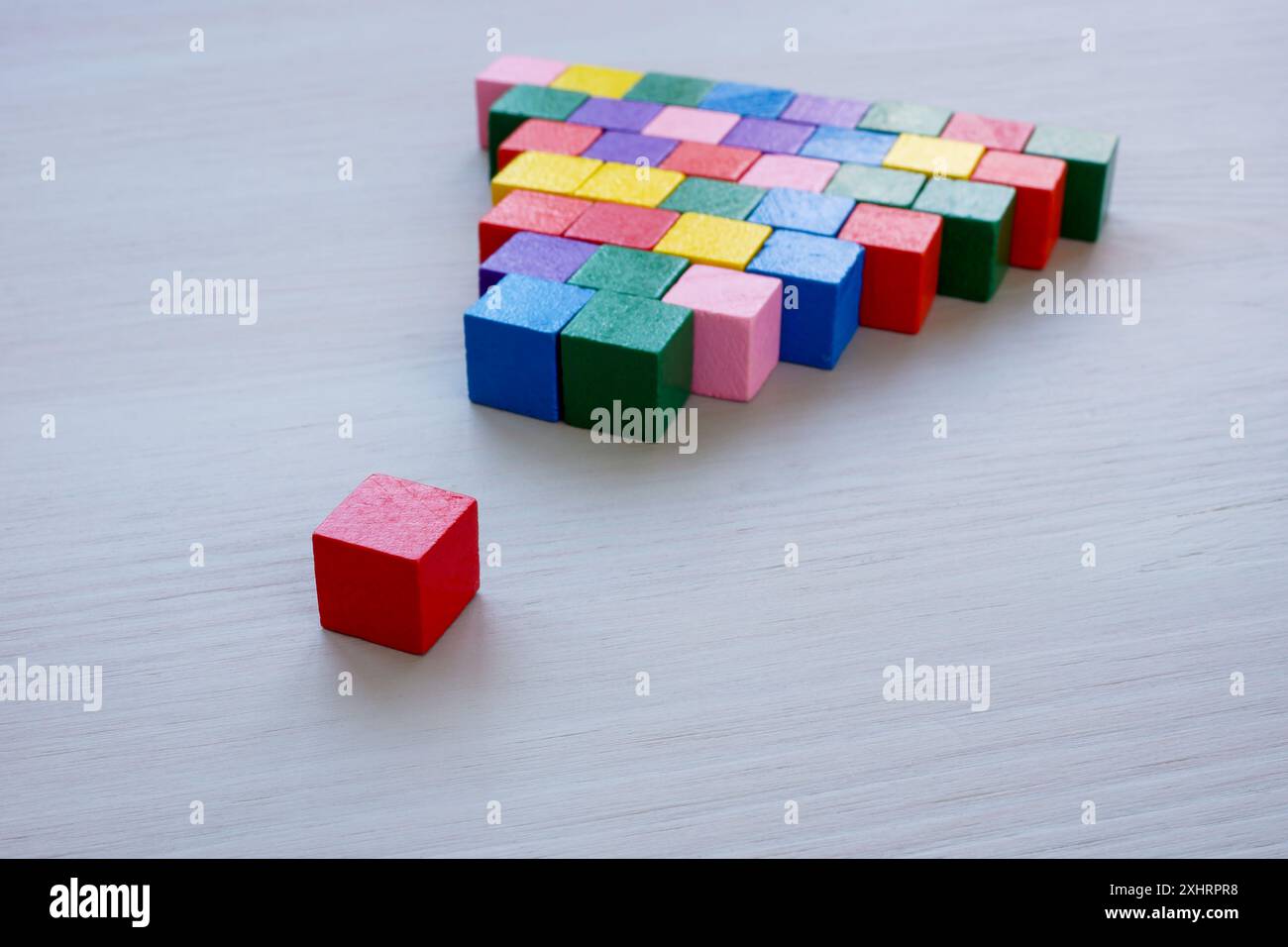 Inclusive leadership. A structure of colored cubes as a symbol of the ...