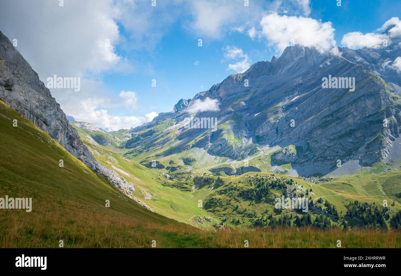 Swiss Alps rising from the ground on a sunny day Stock Photo - Alamy