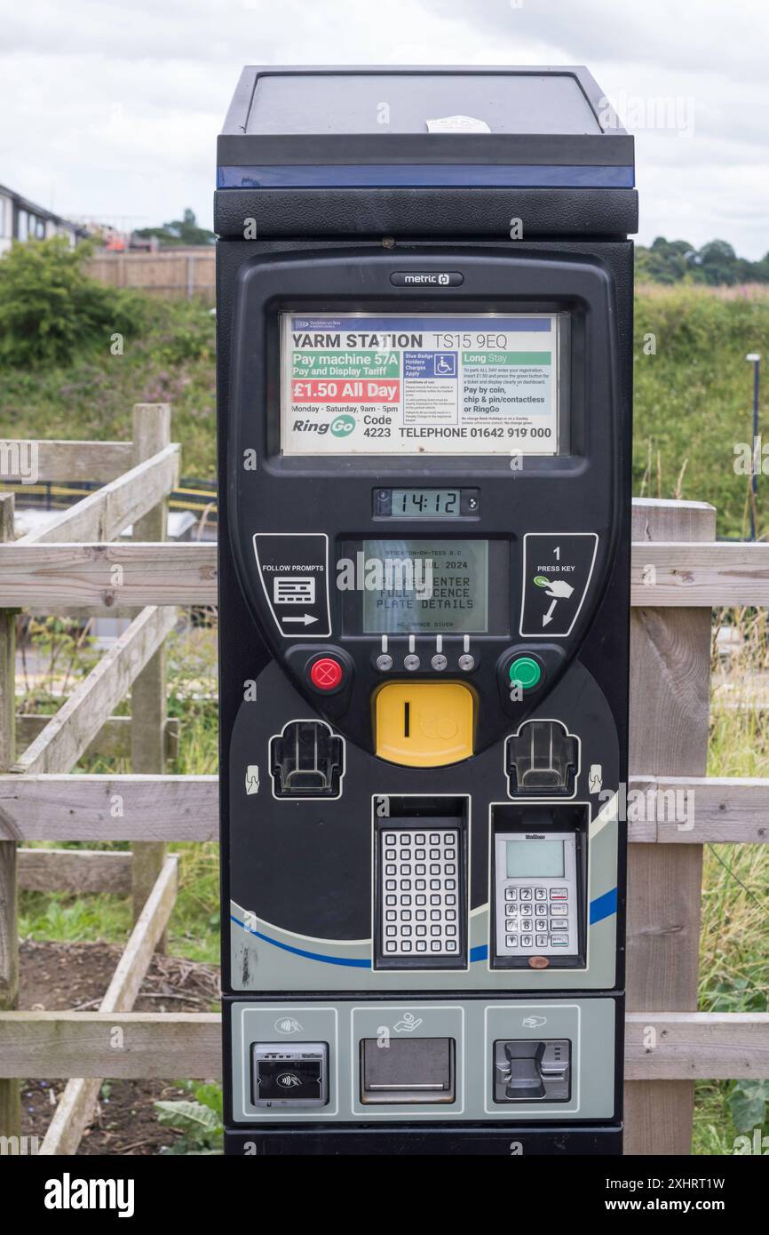 A solar powered Metric car park ticket machine at Yarm station, North ...