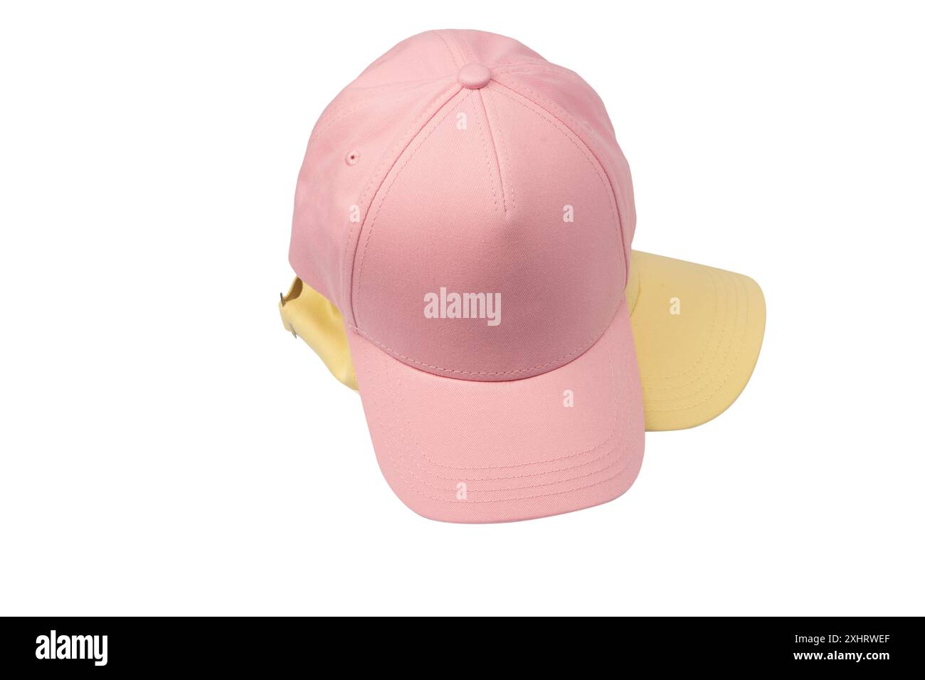 Pink and yellow cap isolated on white background Stock Photo - Alamy