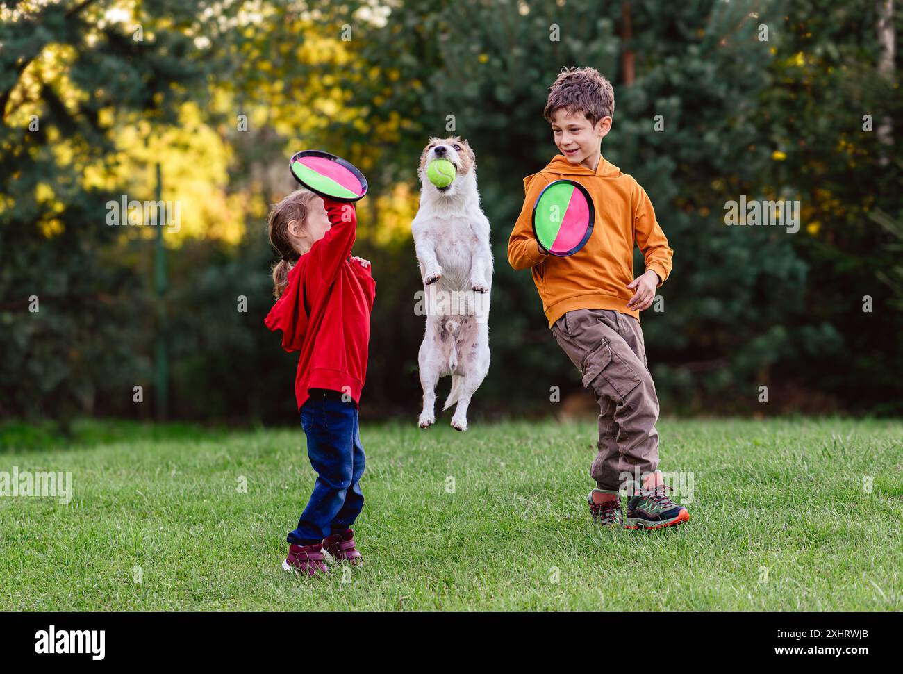 Children playing throw and catch ball hi-res stock photography and ...