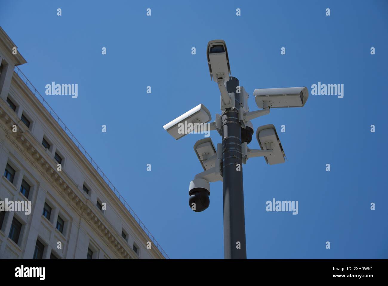 Group os CCTV cameras against blue sky with copy space Stock Photo - Alamy