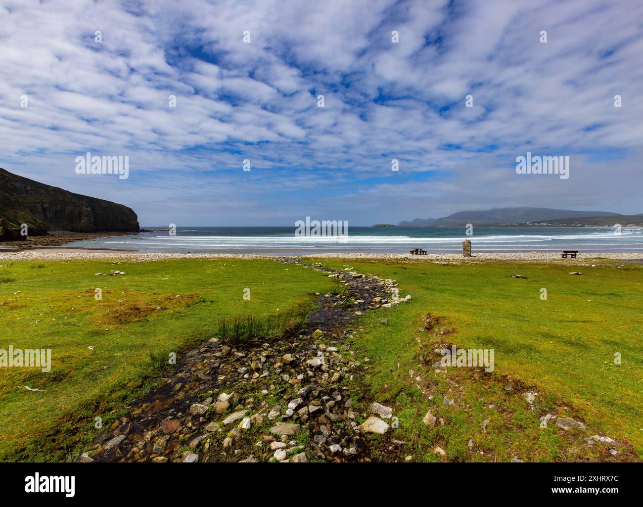 The stream from the waterfall cascading to Keel Bay beach below Minaun ...