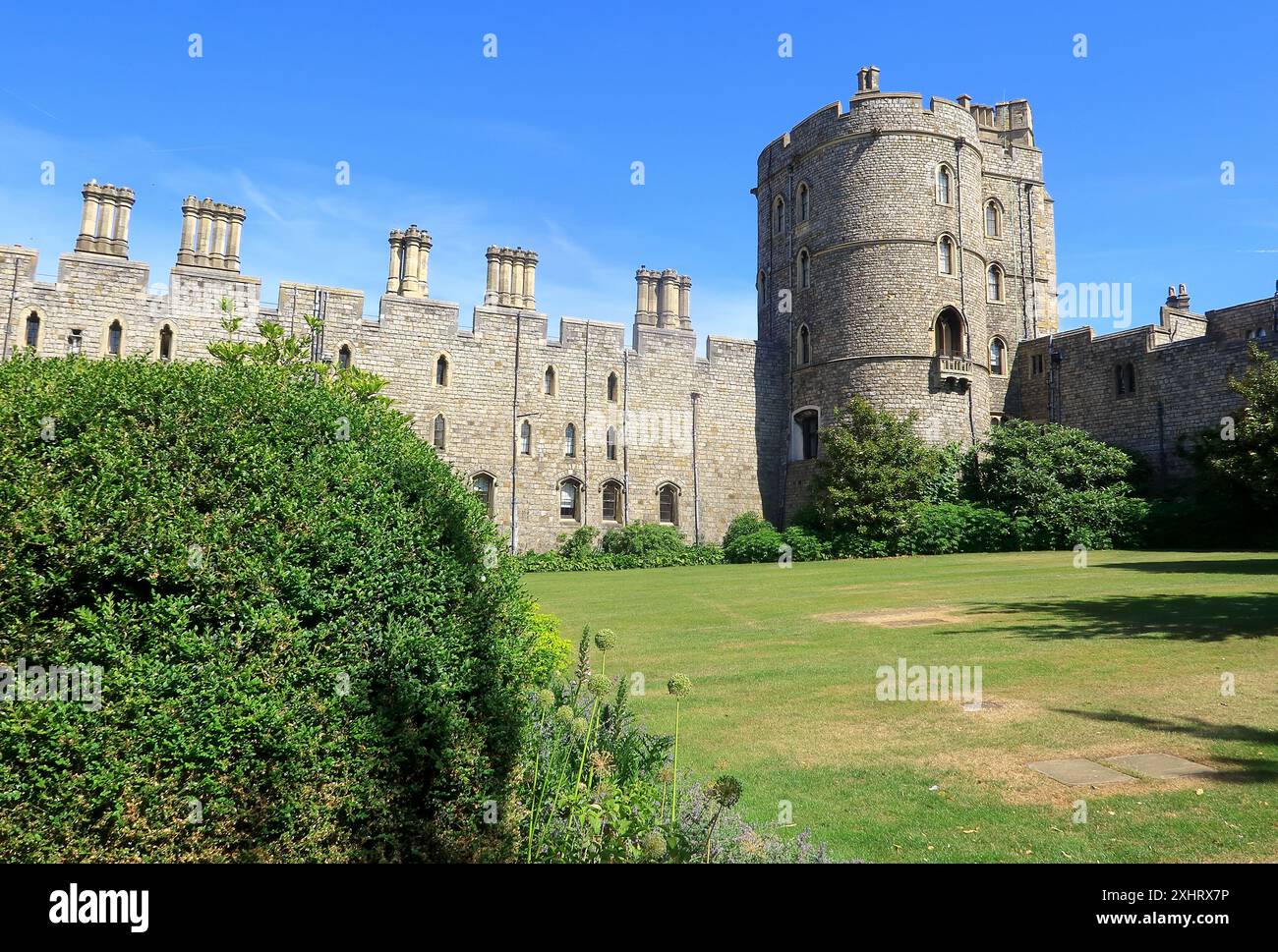 A picturesque landscape scene featuring an ancient tower at Windsor ...