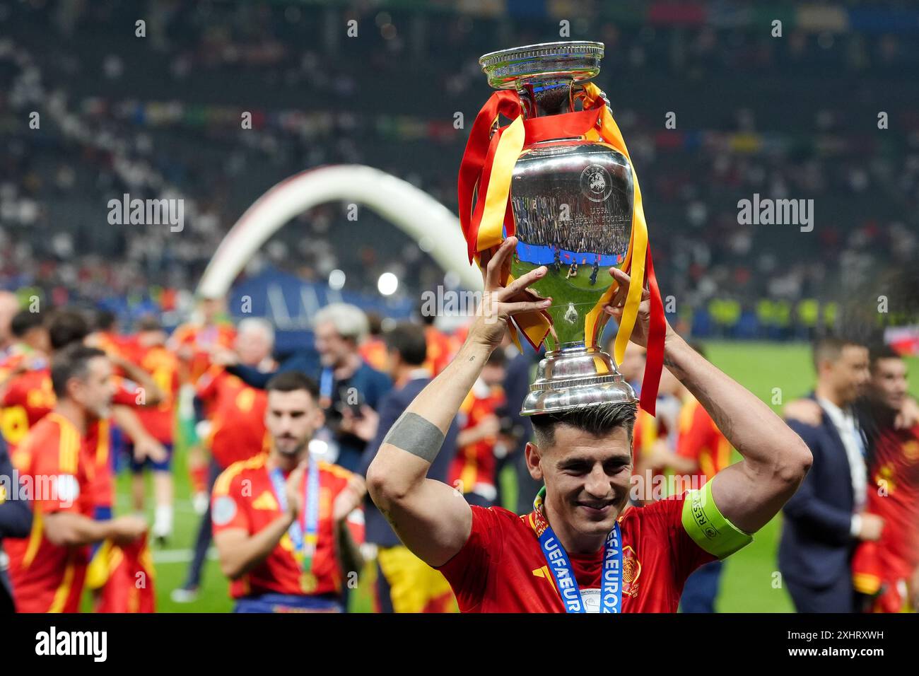 Spain's Alvaro Morata celebrates with the trophy after winning the UEFA ...