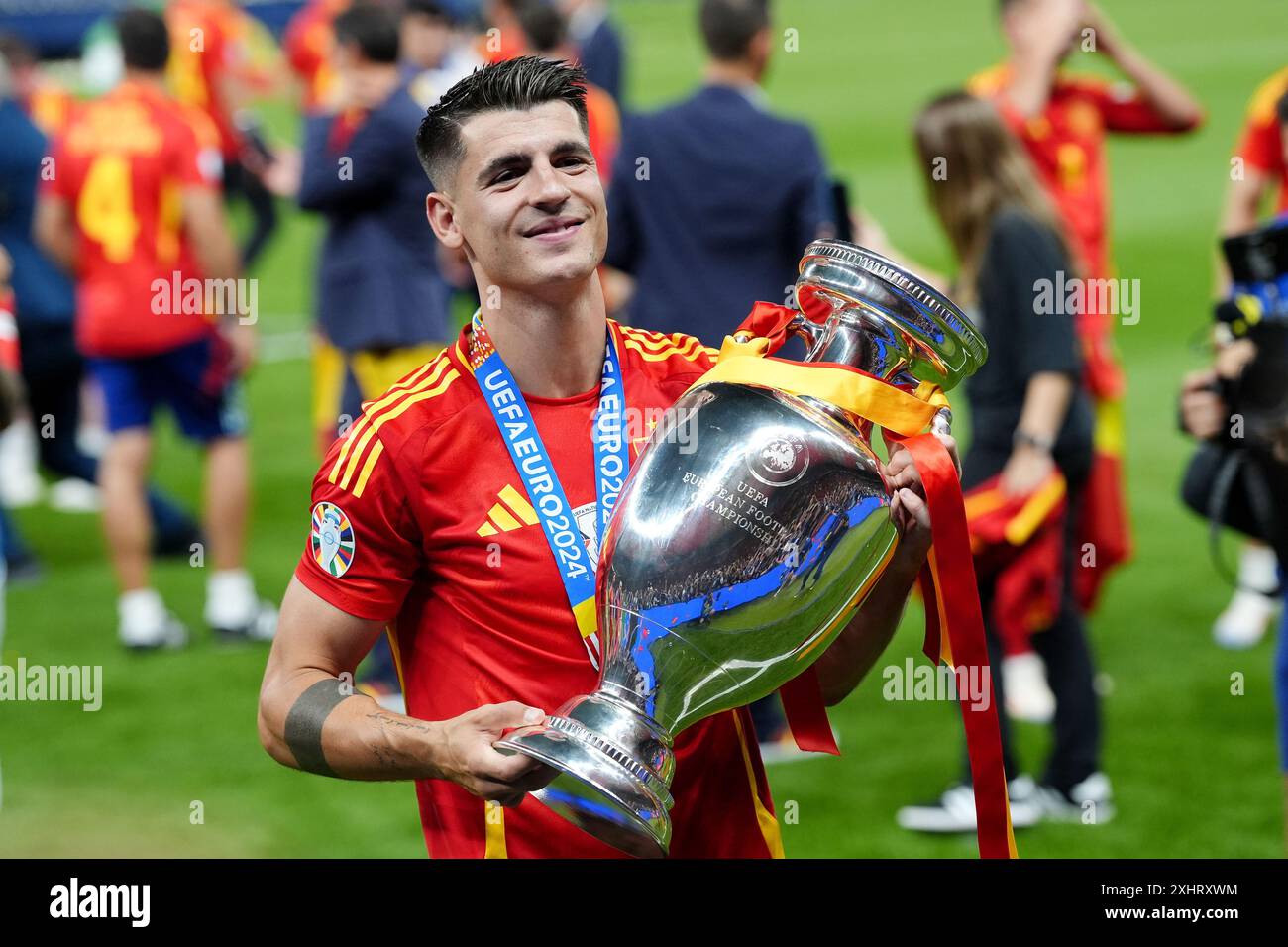 Spain's Alvaro Morata celebrates with the trophy after winning the UEFA ...