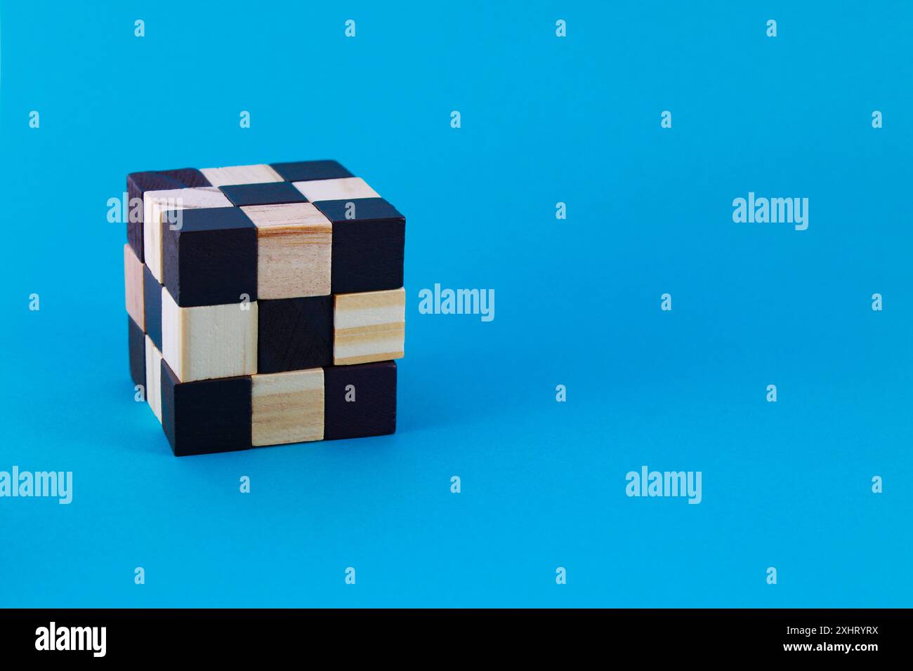 Wooden cube formed with other smaller ones alternating their wood and ...