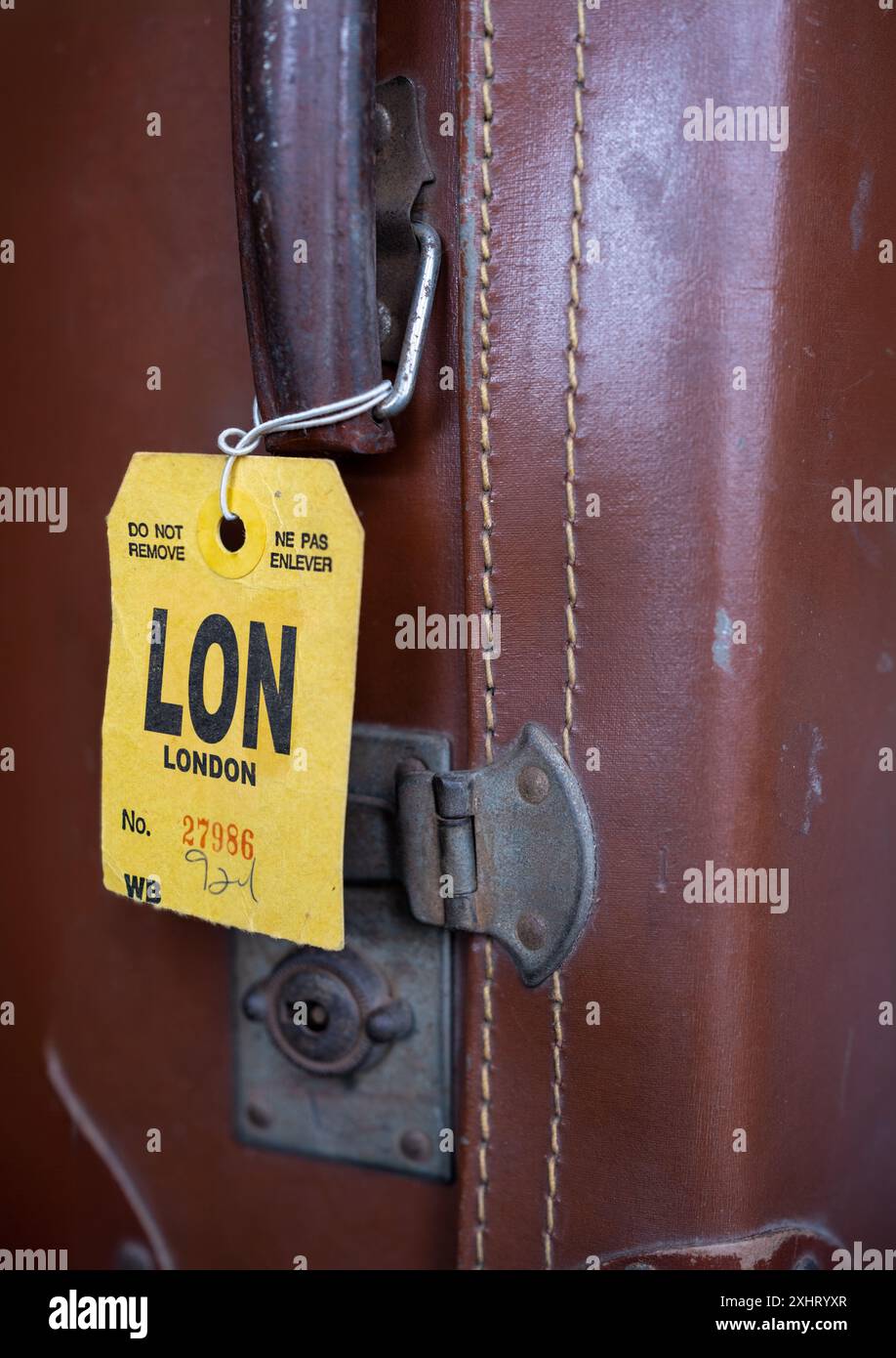 Travel Image Of A Vintage Suitacse With A Retro Luggage Tag For London ...