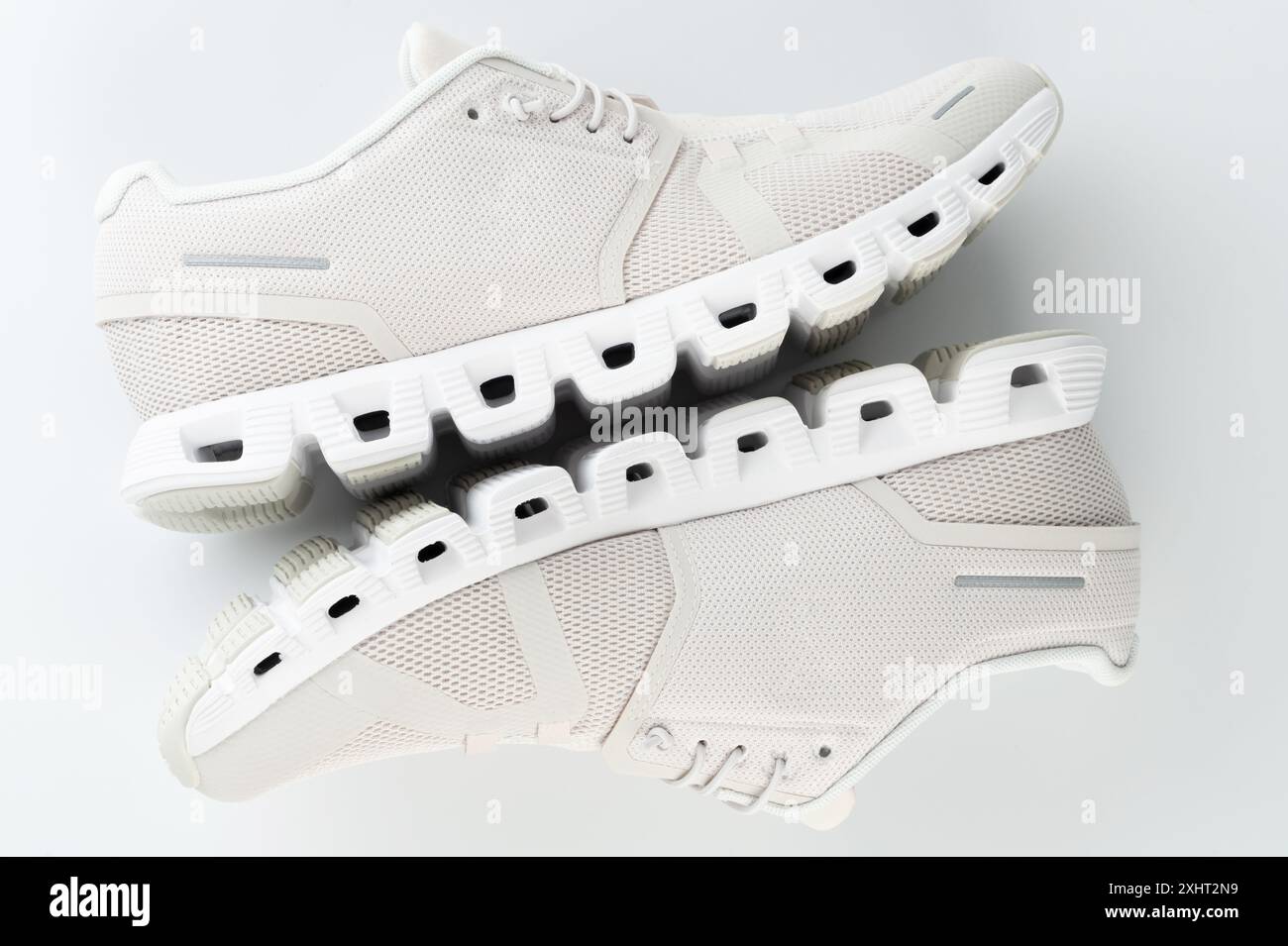 Pair of white sport shoes above top view with laces Stock Photo - Alamy