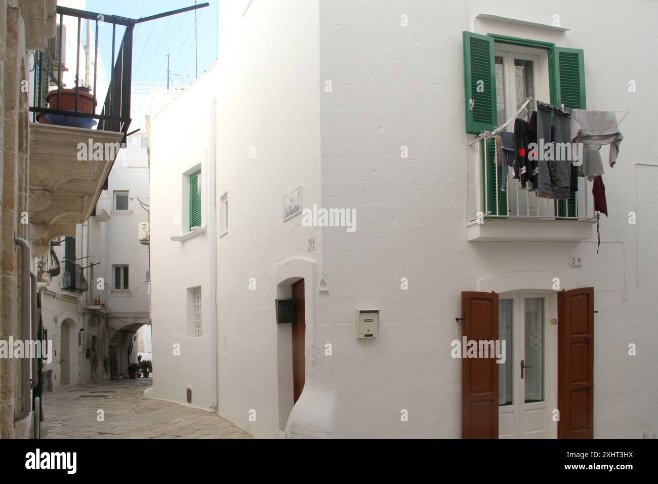 Maze-like alleyways in the historical center of Monopoli, Italy Stock ...