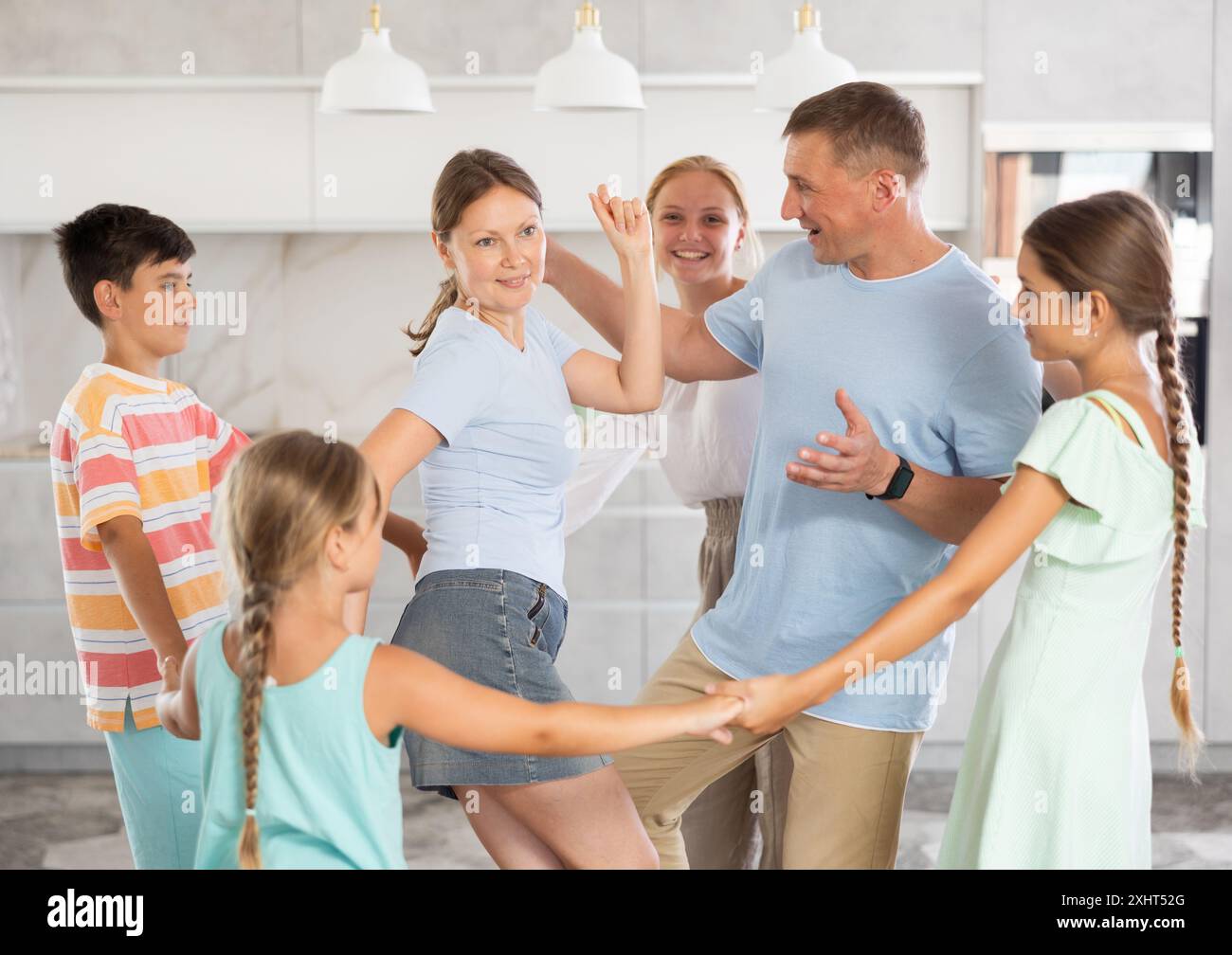 Big family dancing together Stock Photo - Alamy