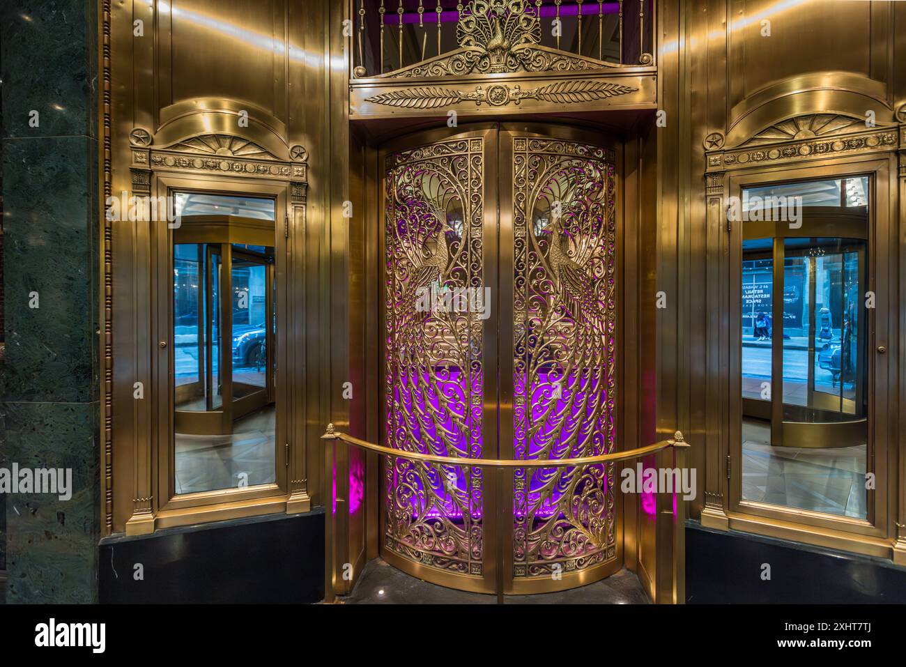 The bronze hand-forged doors of the Palmer House Hilton Hotel are ...