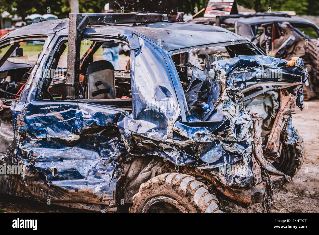 Dented and damaged rear end of a modified car used for a demolition ...